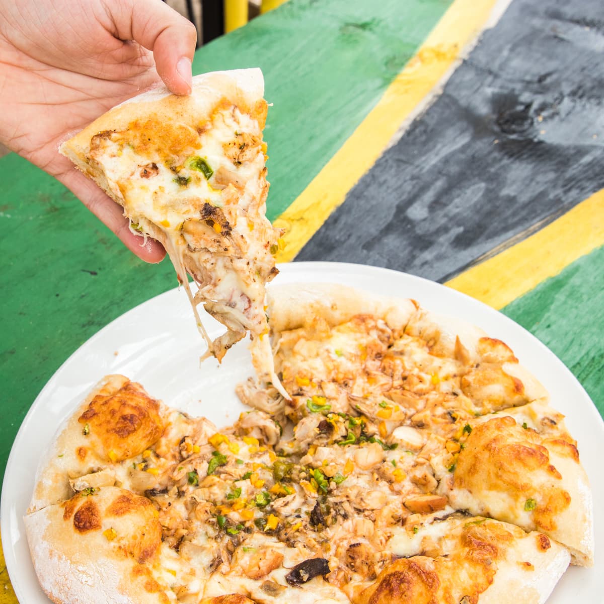 Can You Handle The Heat From Jamaica's Spiciest Pizza? - FoodBeast