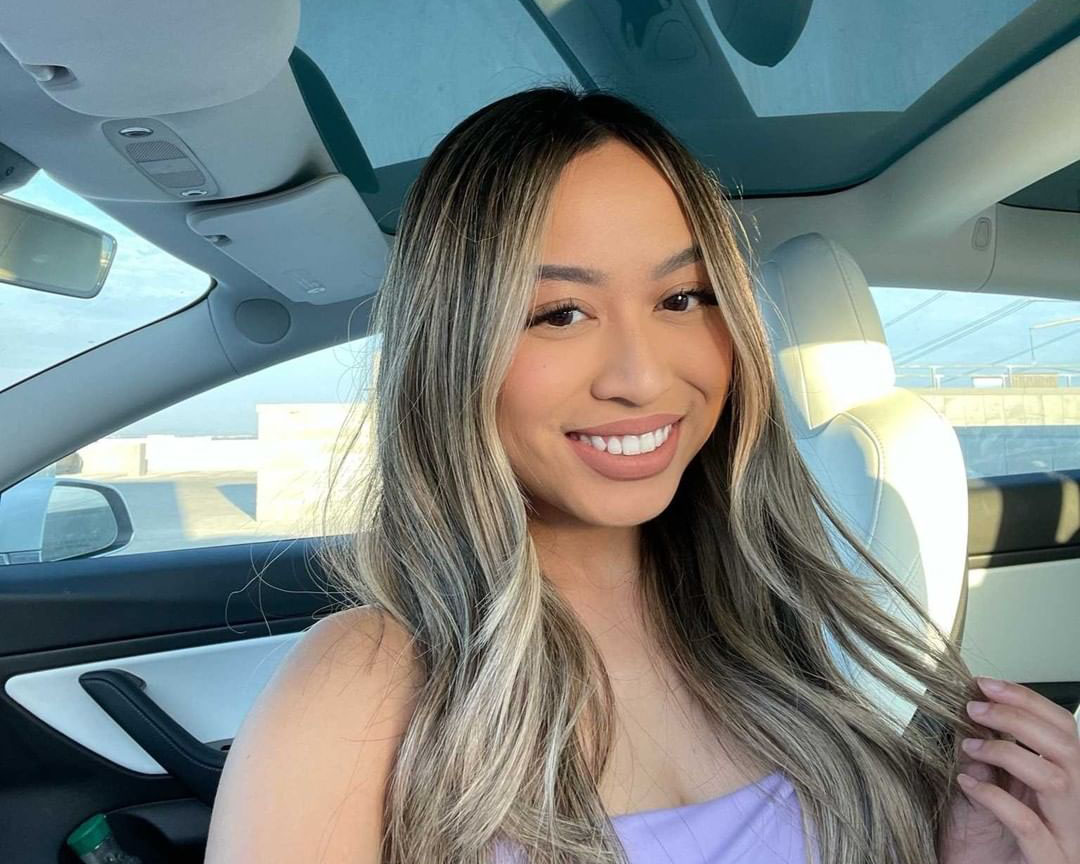 Woman Goes Viral For Cooking Whole Meals Inside Her Tesla